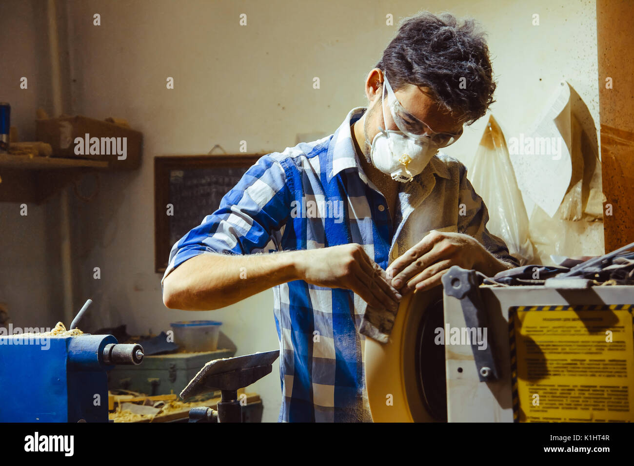 Adult hands turning wood hi-res stock photography and images - Alamy