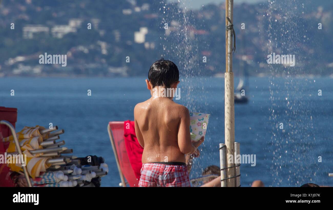 Showering boy hi-res stock photography and images - Alamy