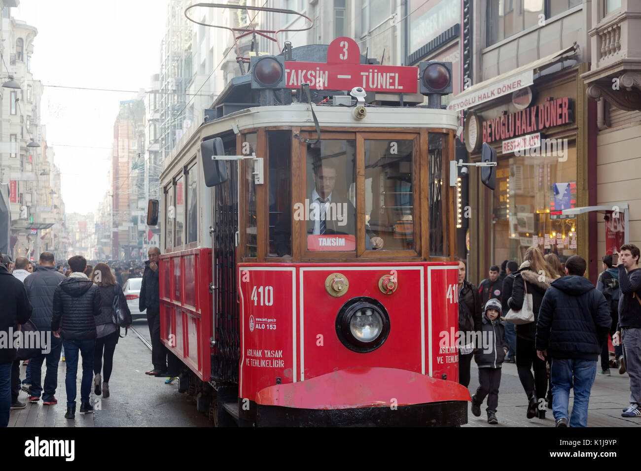ISTANBUL - DECEMBER 27, 2015: Traditional street car is travelling with ...