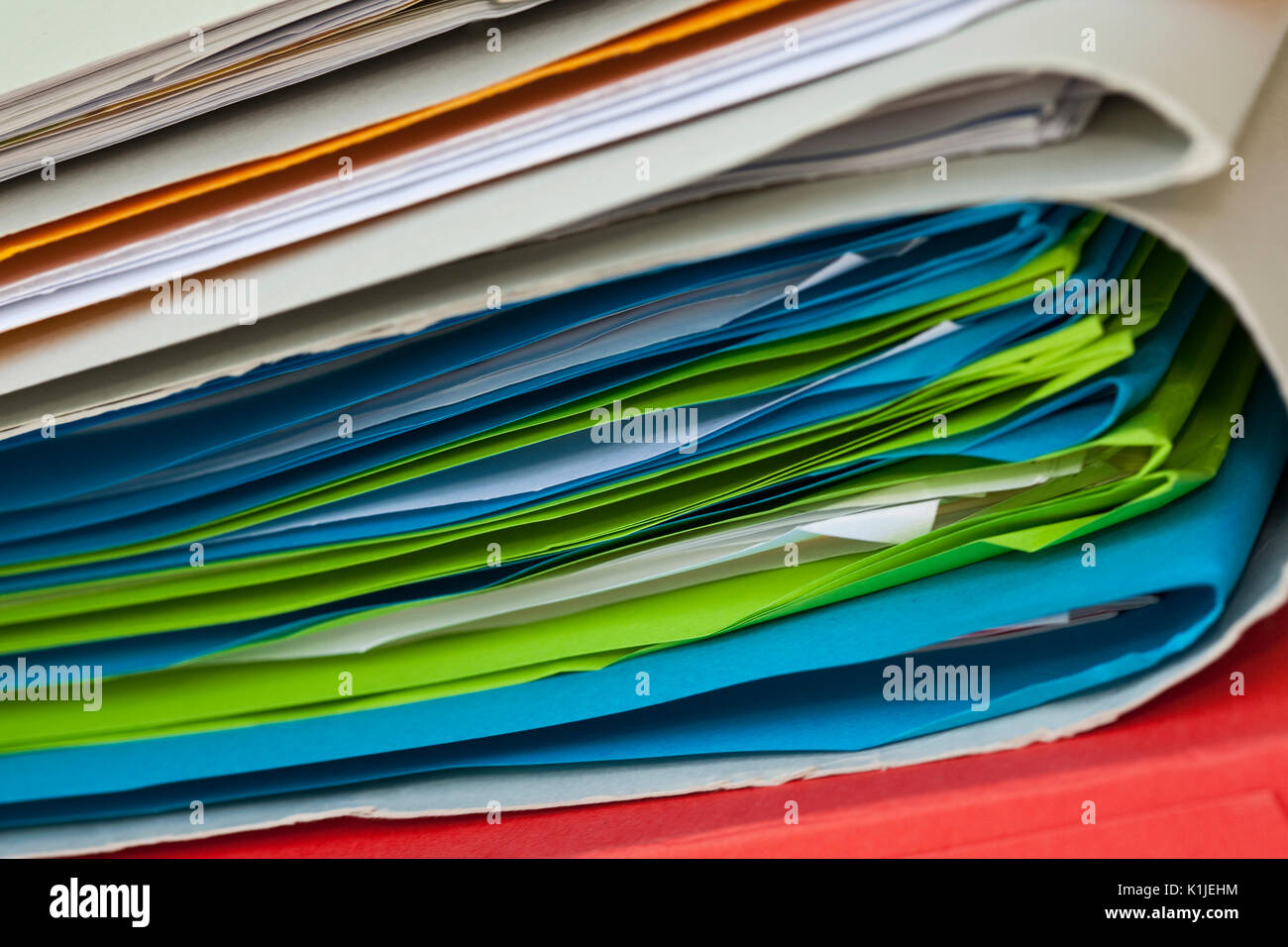 Papers and folders on an office desk Stock Photo - Alamy