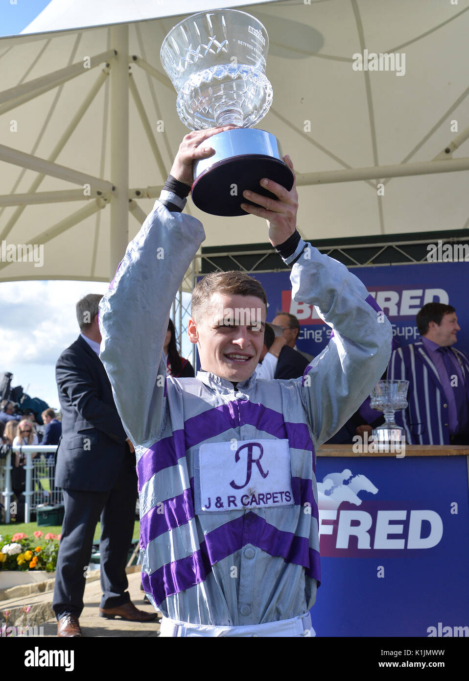 Jockey Callum Rodriguez celebrates after Nakeeta wins the Betfred Ebor ...