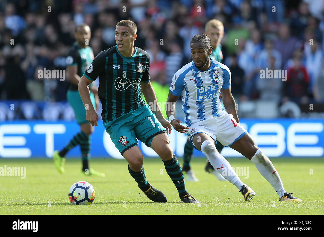 Southampton's Oriol Romeu (left) and Huddersfield Town's Kasey Palmer ...