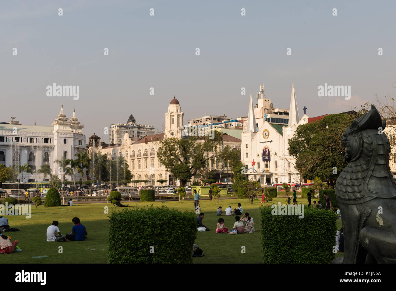 Residents of Yangon relax in Mahabandoola Garden, one of very few green ...