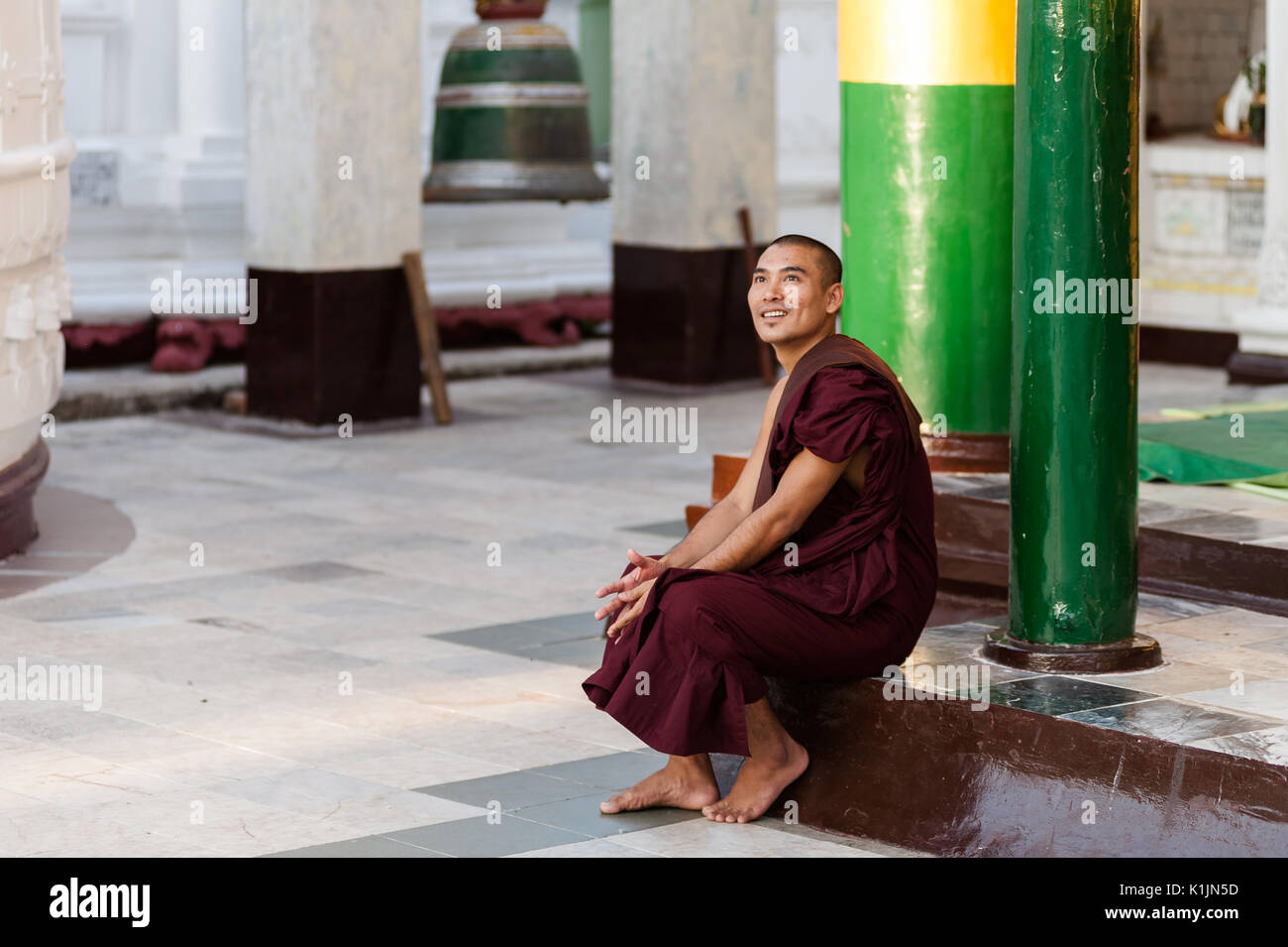Buddhist monk sitting side view hi-res stock photography and images - Alamy