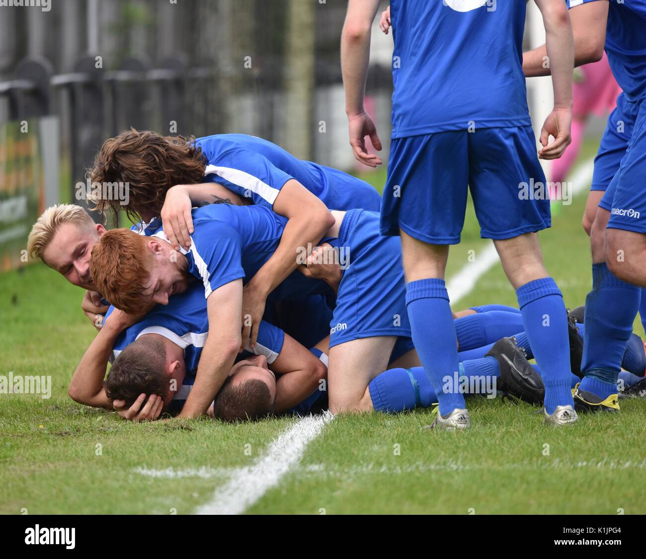 Nelson players celebrate a goal in the non-league match between New ...