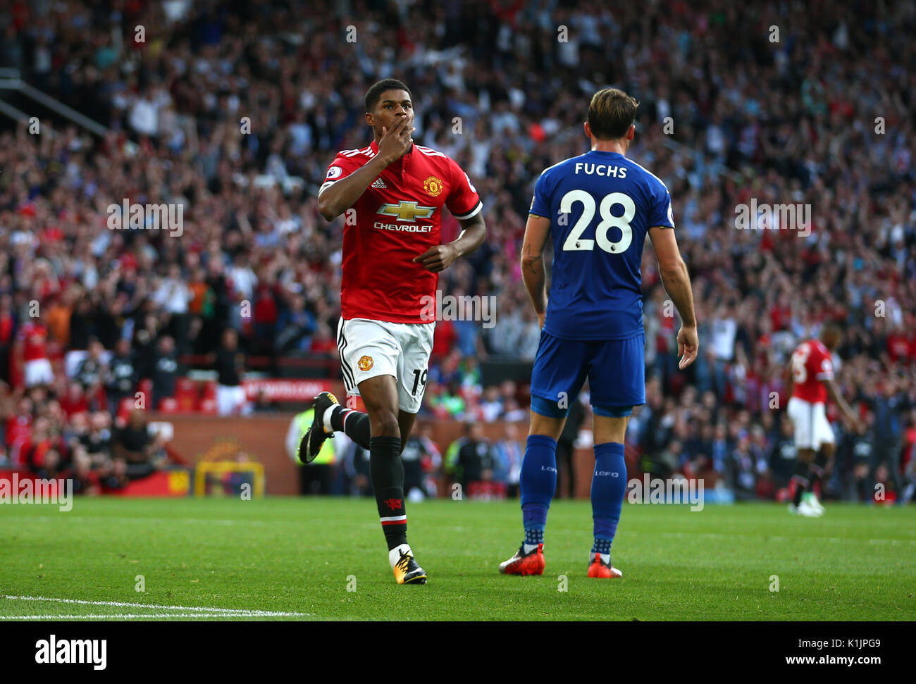 Manchester United's Marcus Rashford celebrates scoring his side's first ...