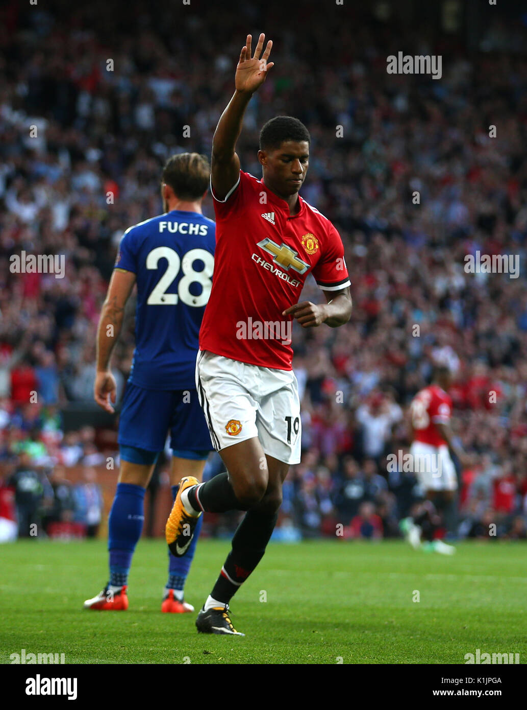 Manchester United's Marcus Rashford celebrates scoring his side's first ...