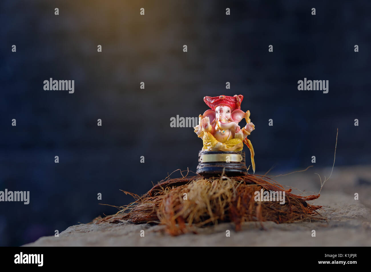 Lord Ganesha on coconut Stock Photo - Alamy