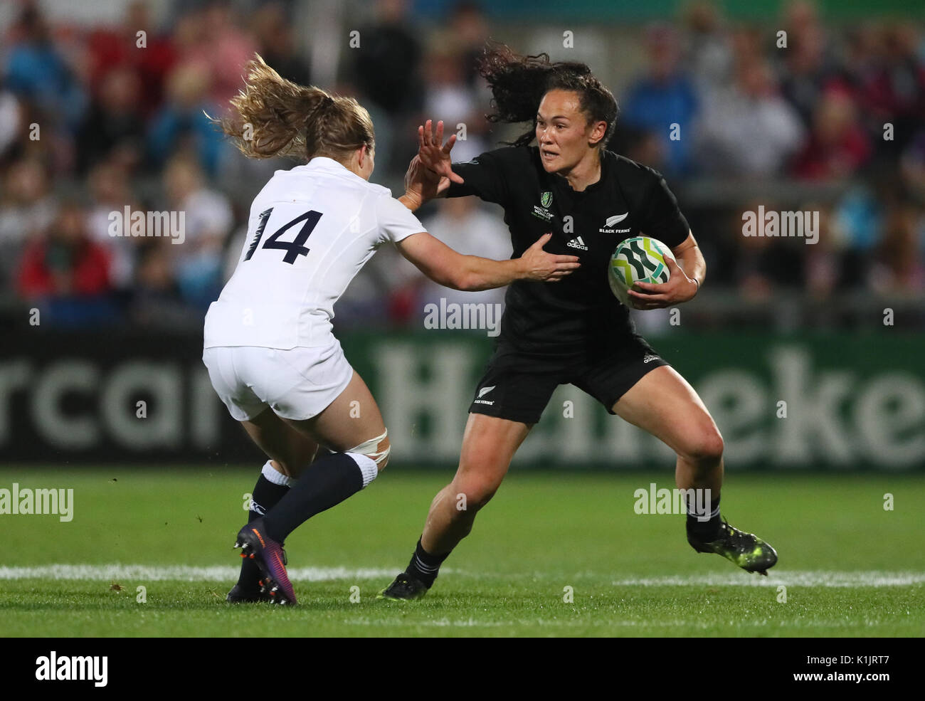 England's Lydia Thompson (left) and New Zealand's Portia Woodman during ...