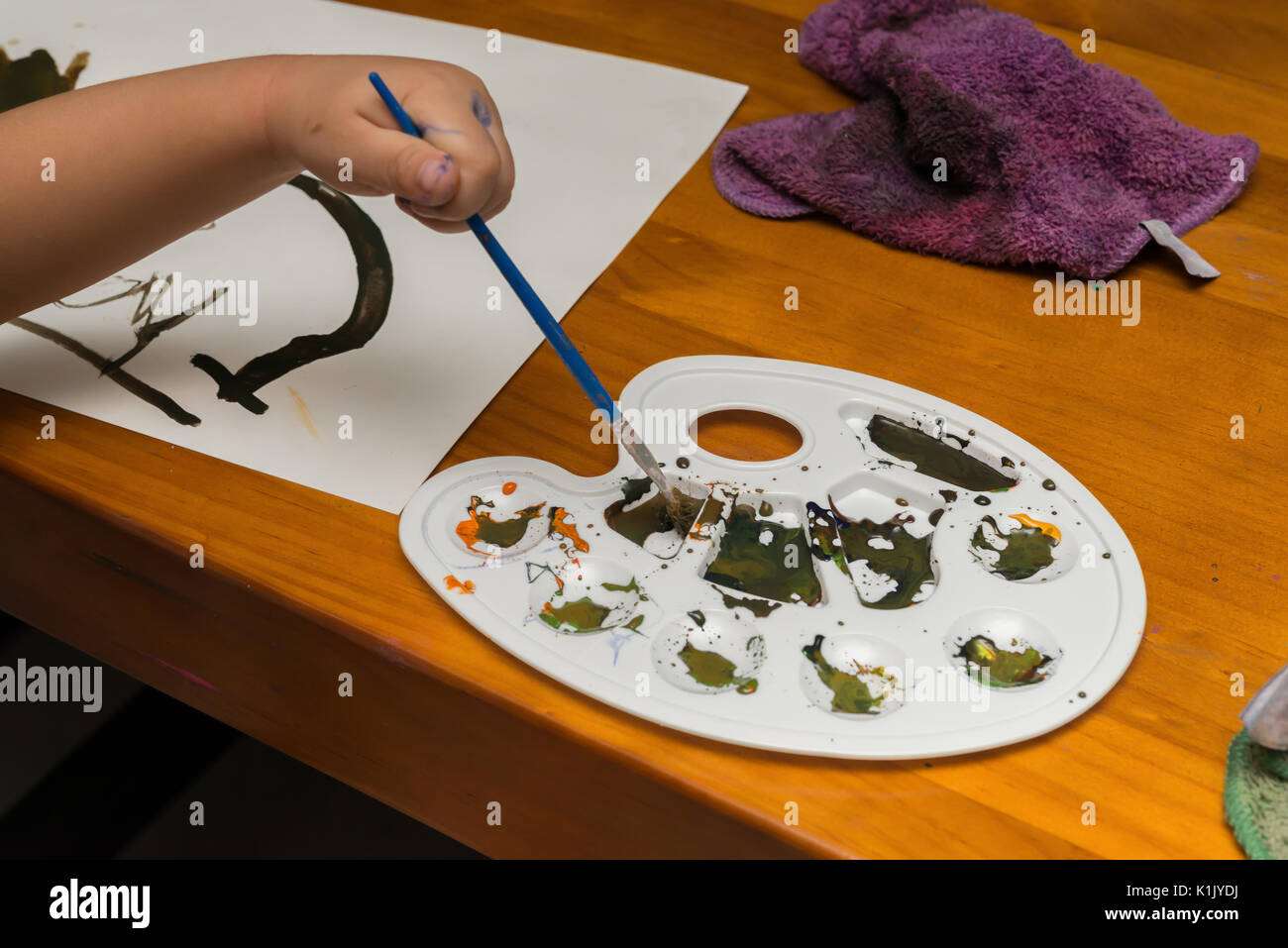 boy doing painting Stock Photo - Alamy