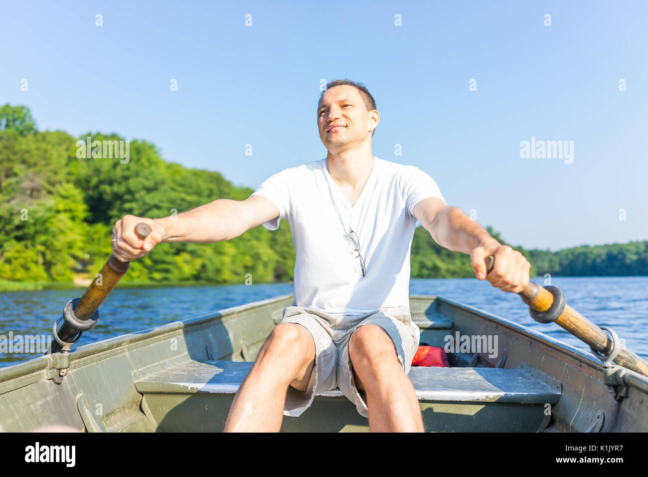 Man rowing boat hi-res stock photography and images - Alamy