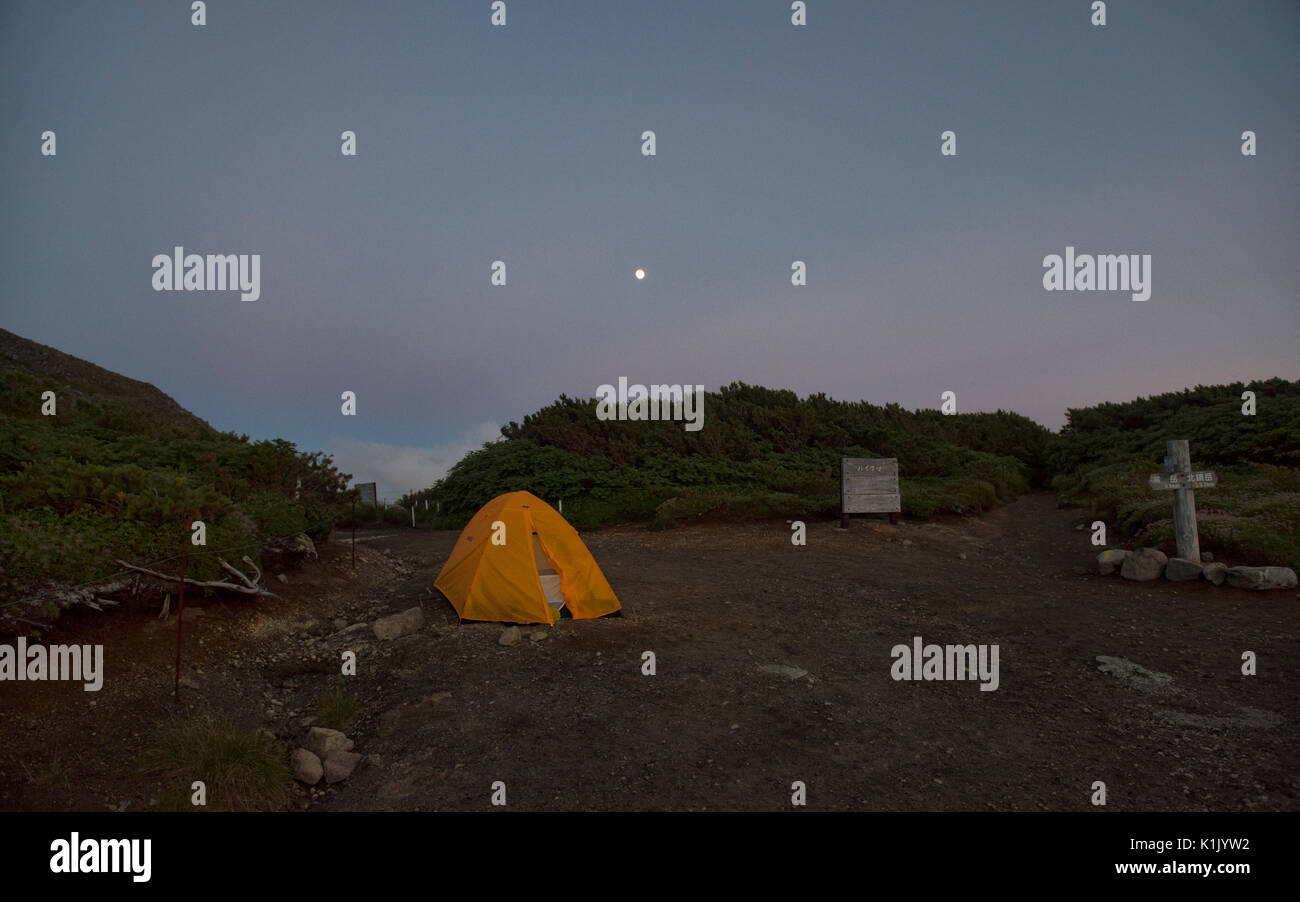 Full moon and lone tent, Daisetsuzan National Park, Hokkaido, Japan ...