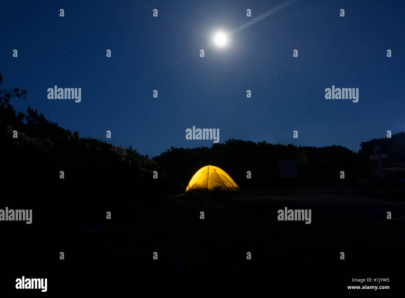 Full moon and lone tent, Daisetsuzan National Park, Hokkaido, Japan ...