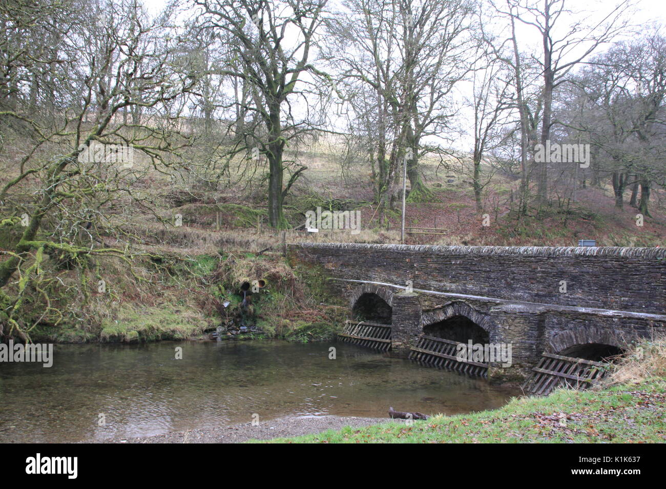 River Barle flowing through the village of Simonsbath on the B3223 in ...