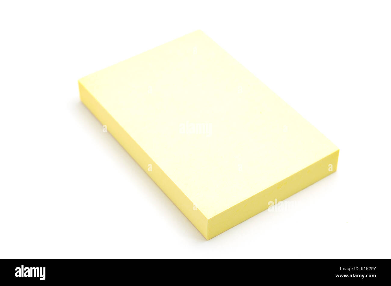Yellow sticky note on isolated white background Stock Photo - Alamy