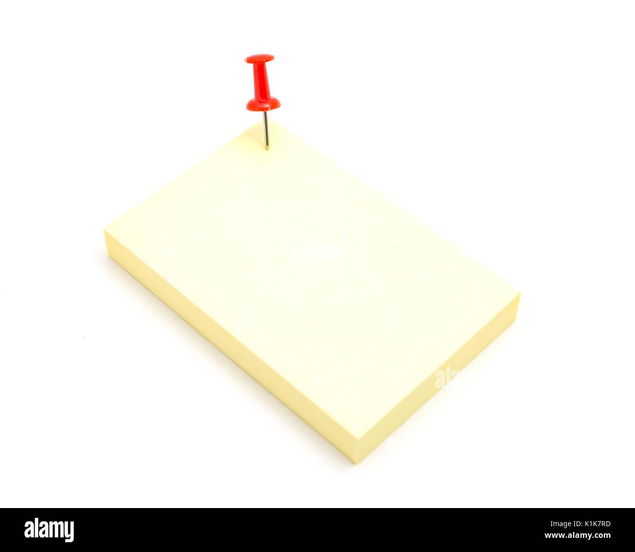 Red color push pin and yellow sticky note on isolated white background ...