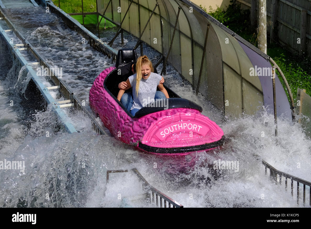 Water splash log flume ride hi-res stock photography and images - Alamy