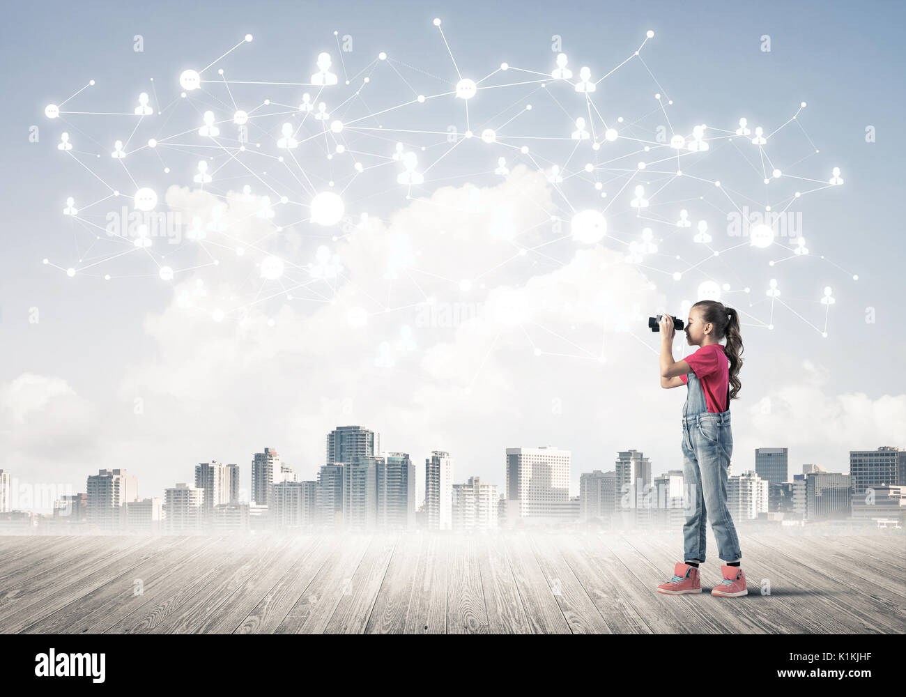 Cute kid girl standing on wooden floor and looking in binoculars Stock ...