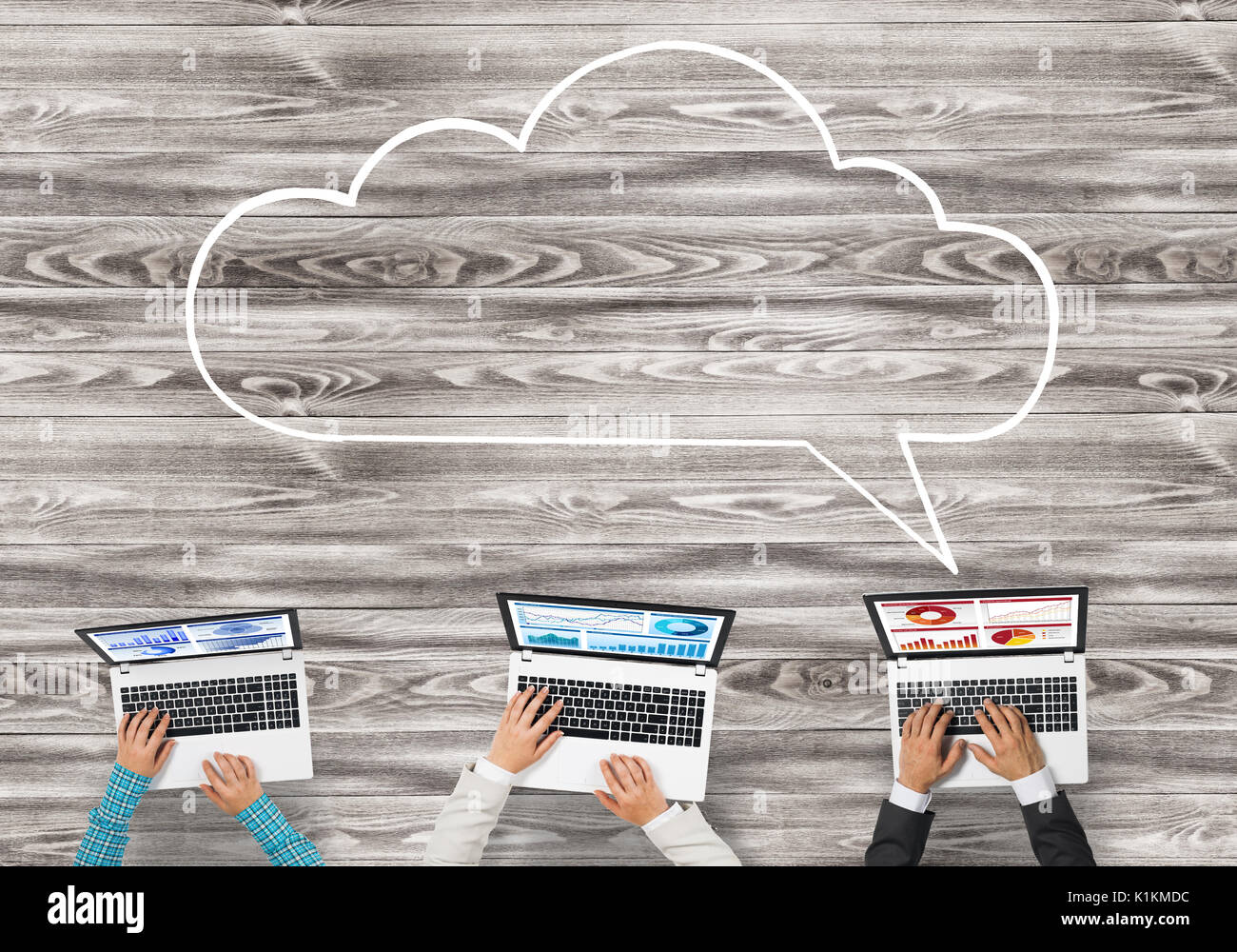 Group of people with devices in hands working together as symbol of ...