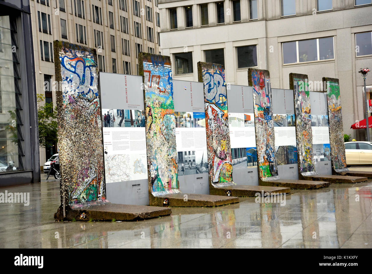 The Berlin Wall was a guarded concrete barrier that physically and ...