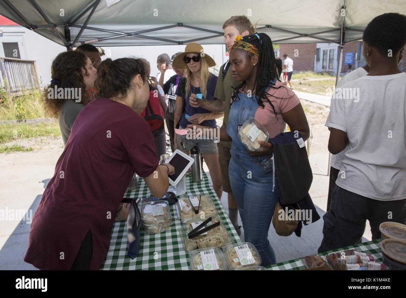 Students from the Detroit Community School participate in a ...
