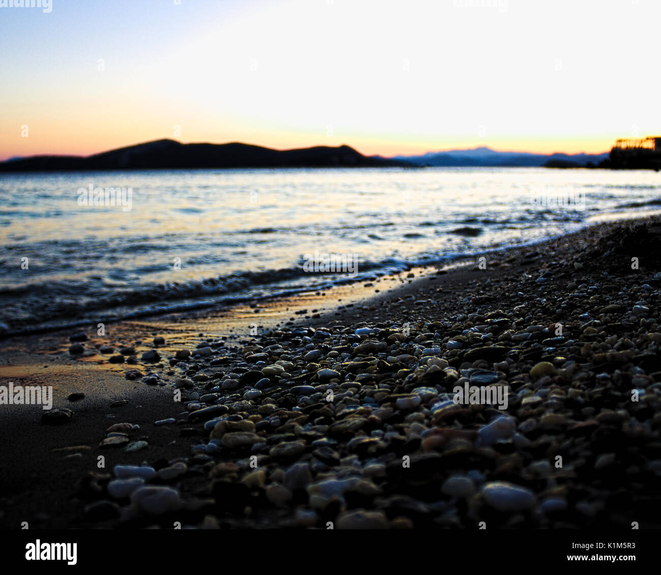 Sunset on the beach in Nea Styra, Euboia, Greece Stock Photo - Alamy