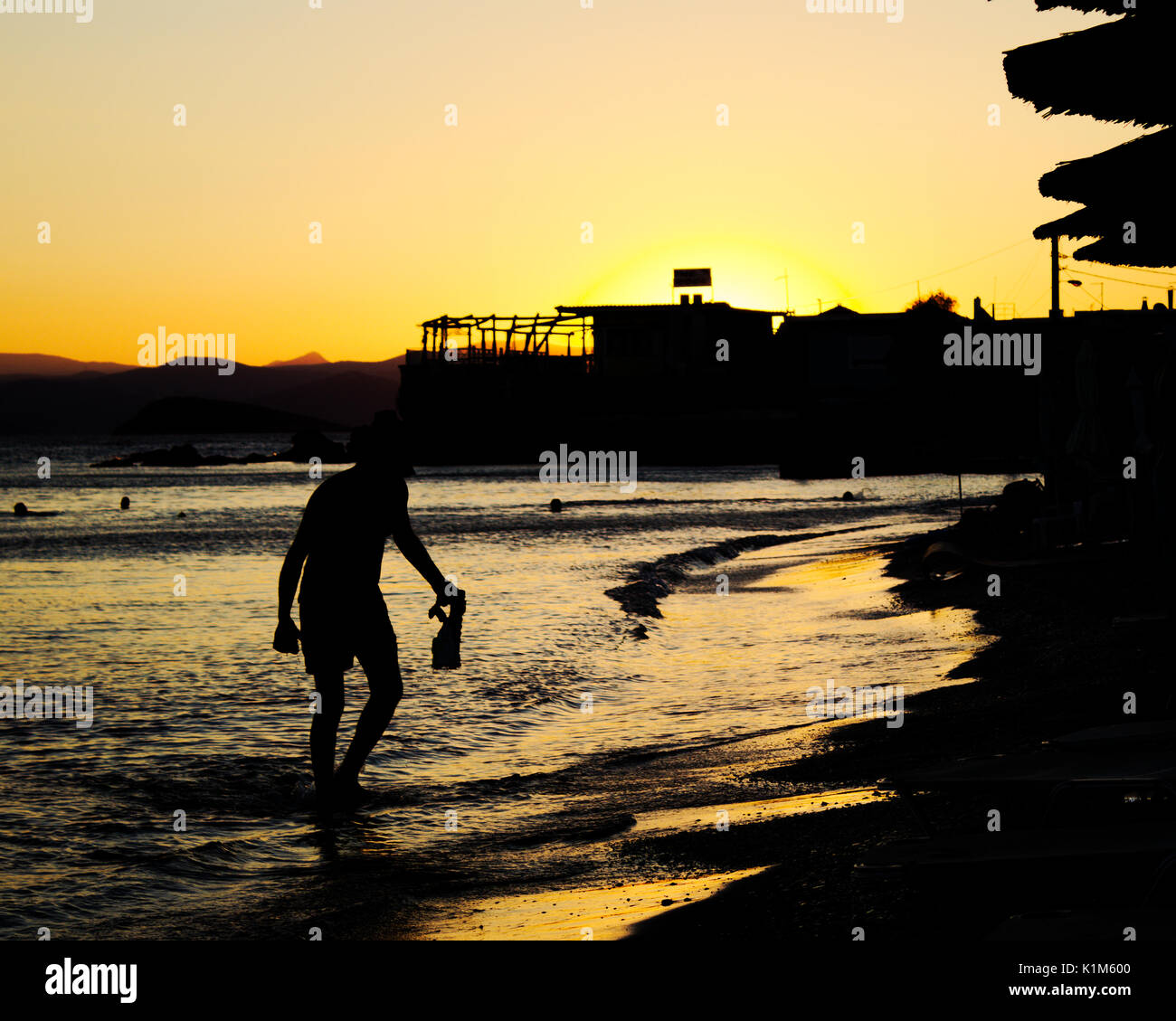 Sunset on the beach in Nea Styra, Euboia, Greece Stock Photo - Alamy