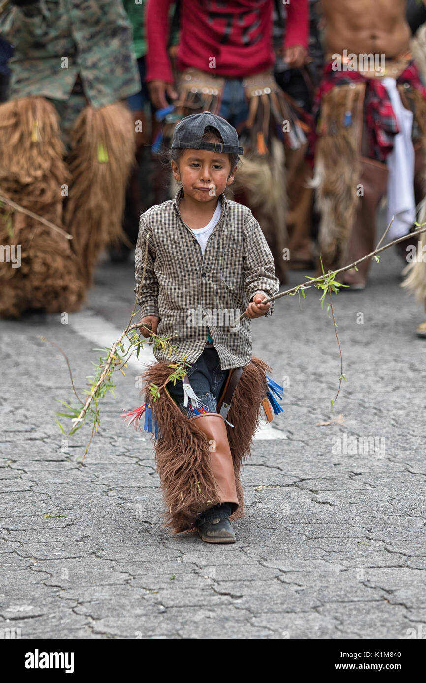 quechua indigenous boy at the Inti Raymi parade in Ecuador Stock Photo ...