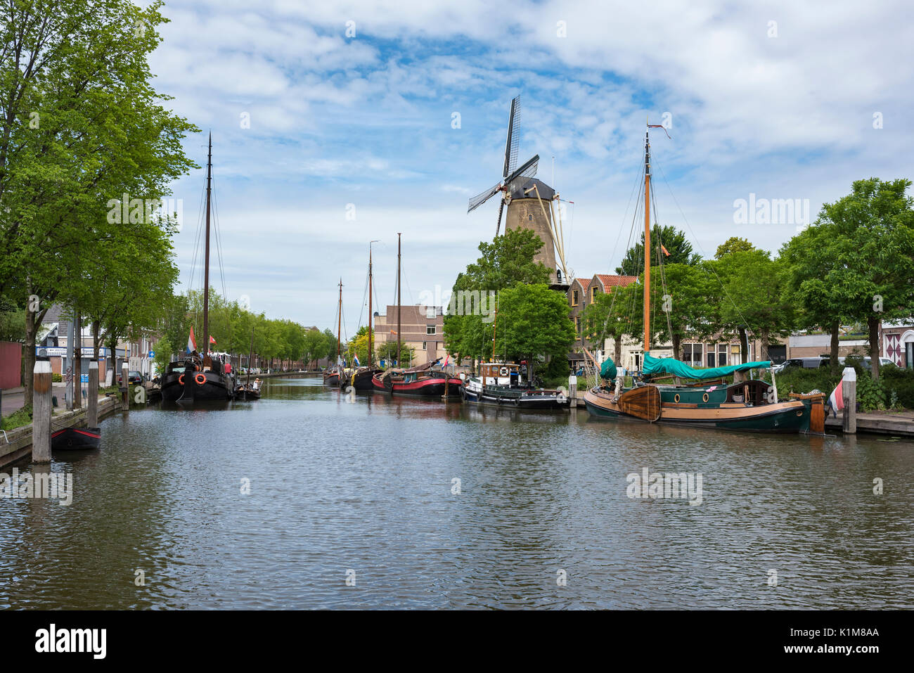Harbor with sailing boats and windmill, Binnenhaven, Gouda, Zuid ...