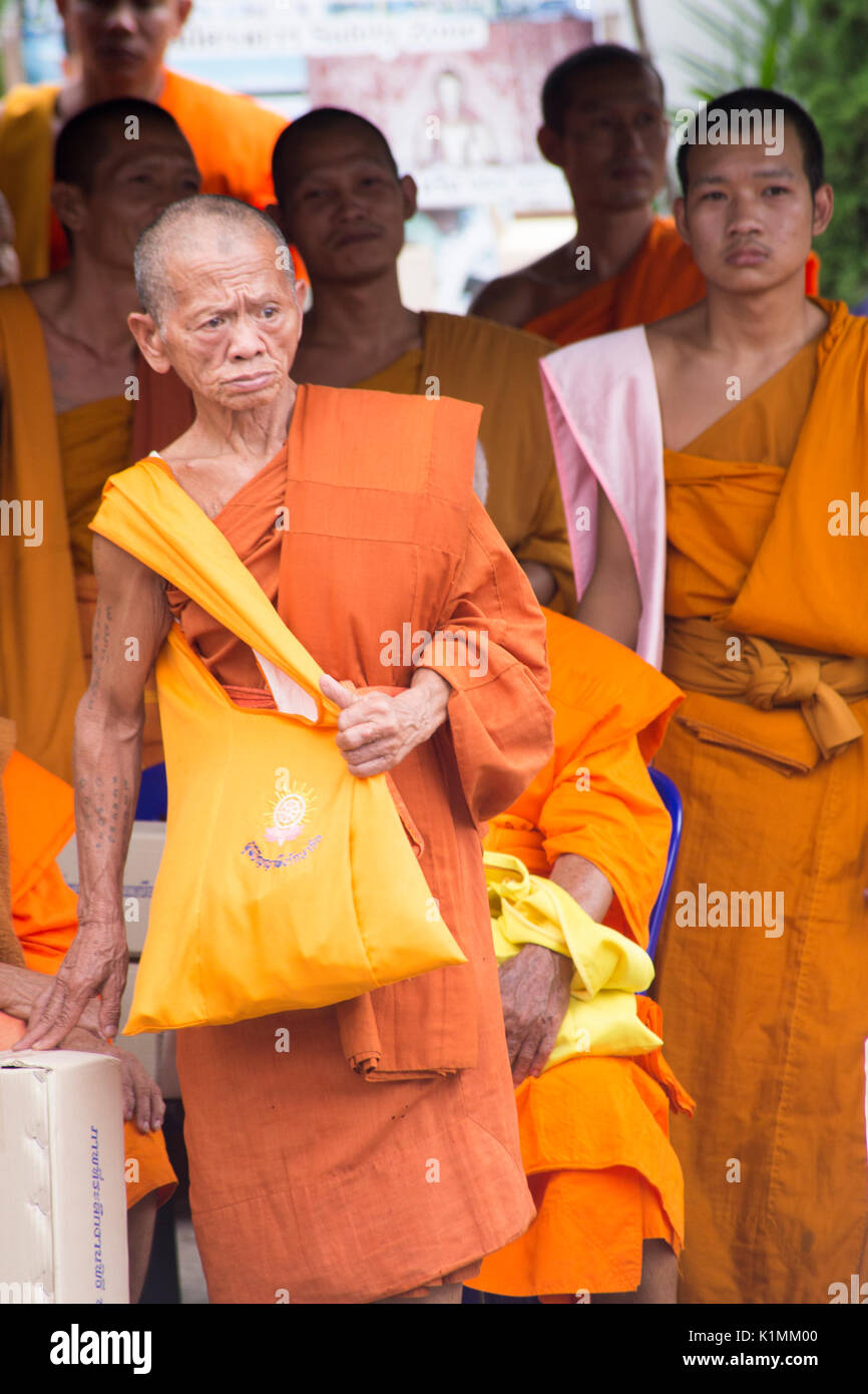 Buddhist monks leaving temple hi-res stock photography and images - Alamy