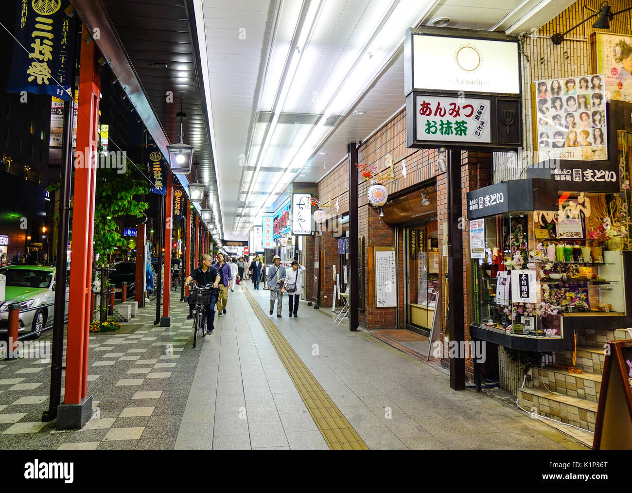 Tokyo, Japan - Mar 19, 2017. People walking on night street at Taito ...