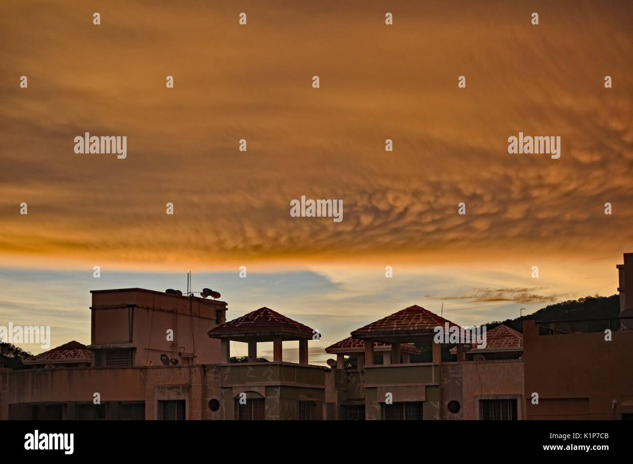 Amazing Storm Cloud Floating Over A Building Stock Photo - Alamy