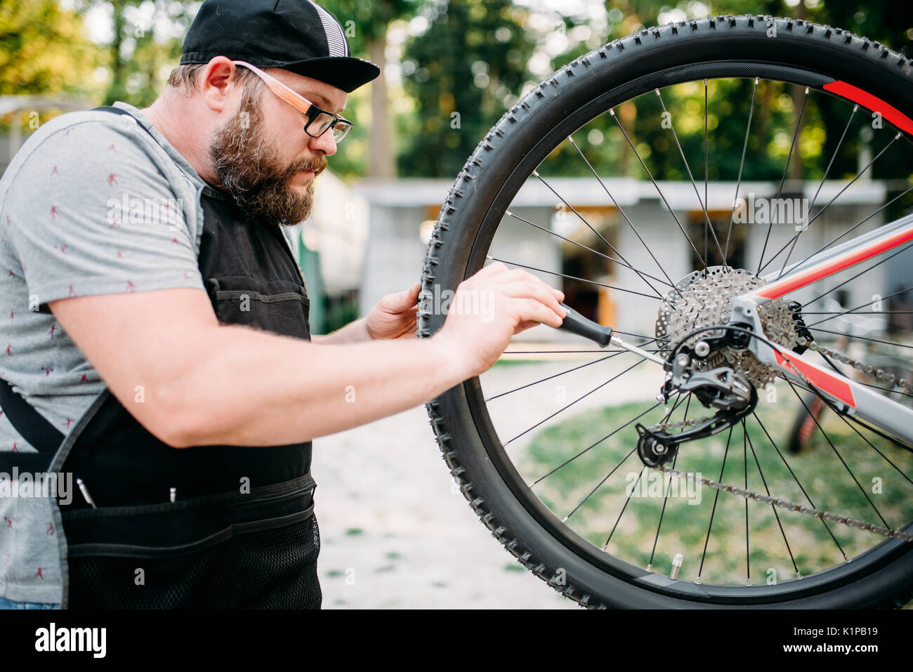 Cycle repairer hi-res stock photography and images - Alamy