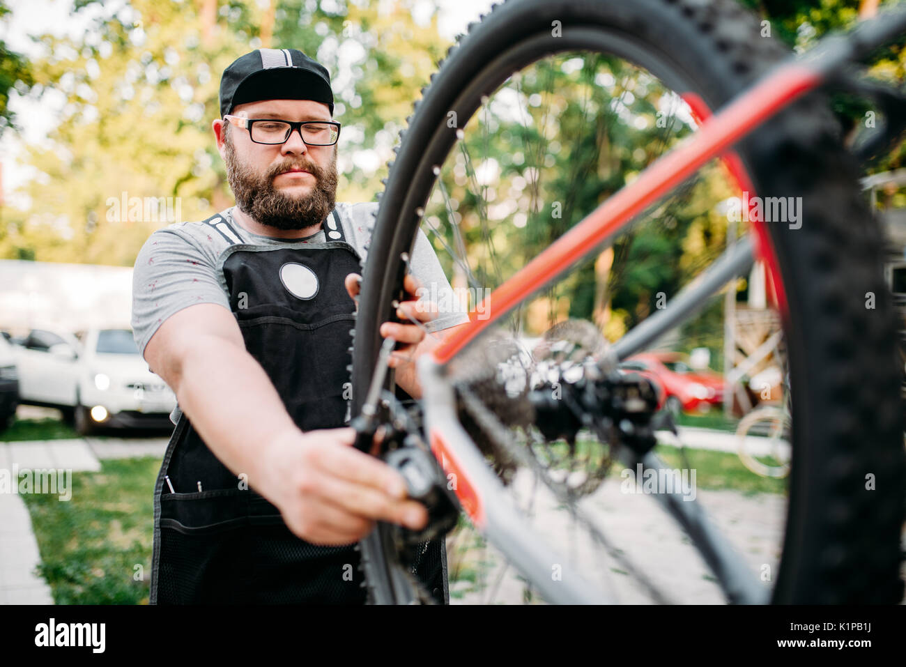 Bicycle mechanic repair bike with broken speed shifter, cycle workshop ...