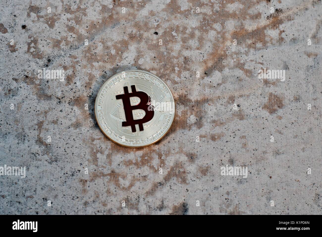 Digital currency physical gold red bitcoin coin. Outdoor money concept ...