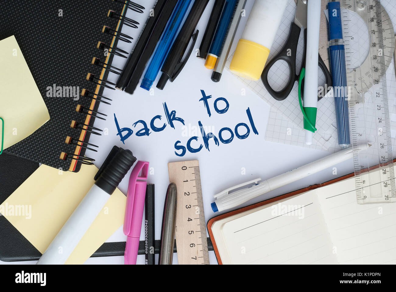 School set with back to school inscription in notebook and stationery ...