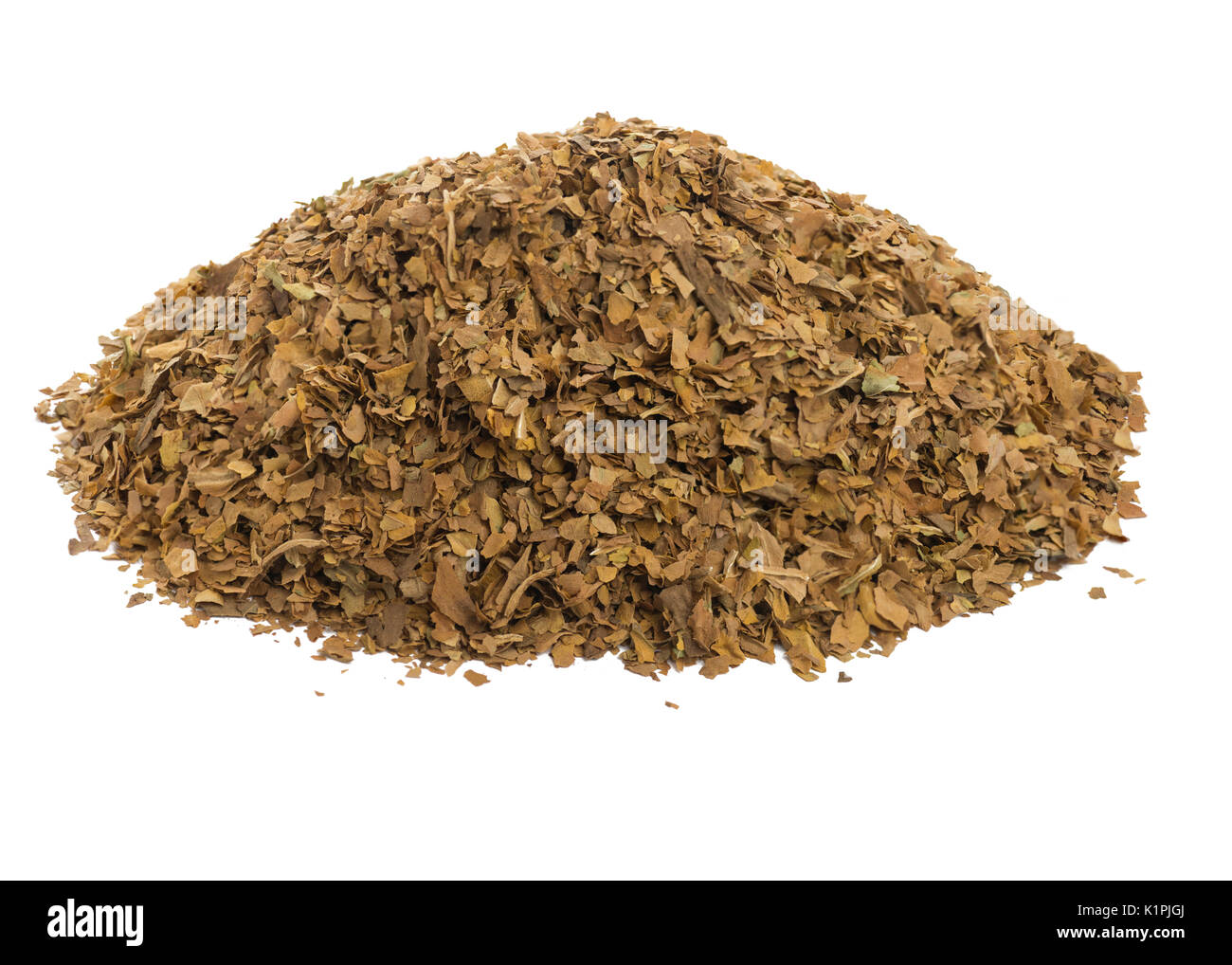 pile of unprocessed dried tobacco leaves, on a white isolated ...