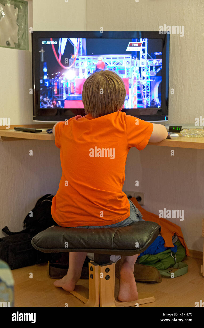 young boy watching TV Stock Photo - Alamy