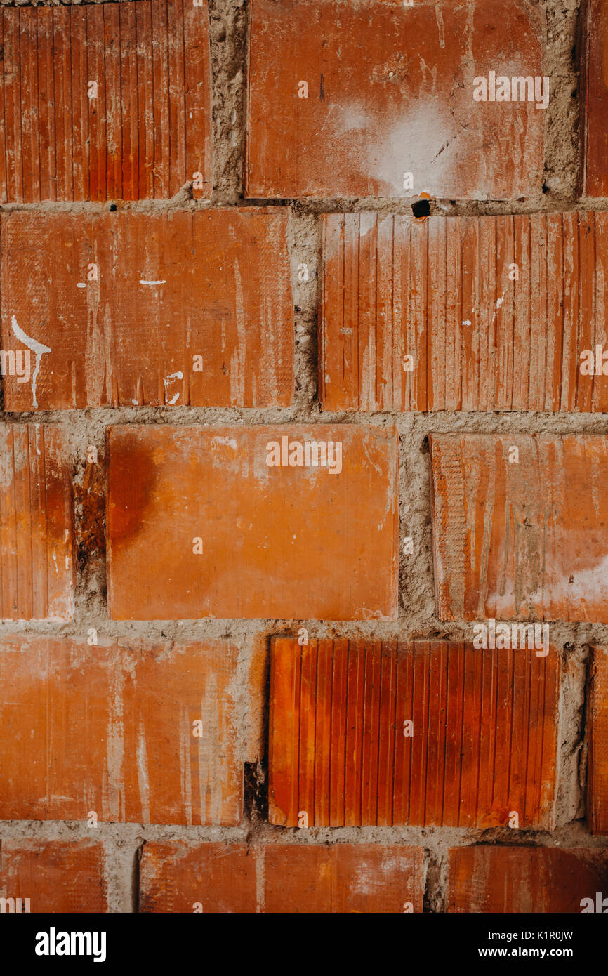 orange brick stone wall background Stock Photo - Alamy
