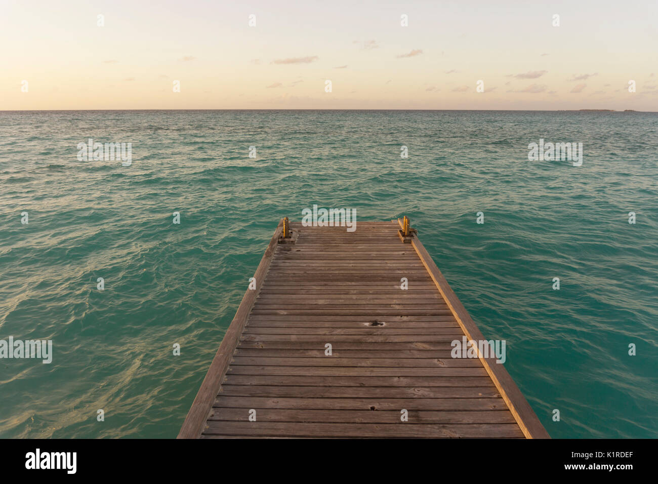 Wooden pier sunset exotic hi-res stock photography and images - Alamy
