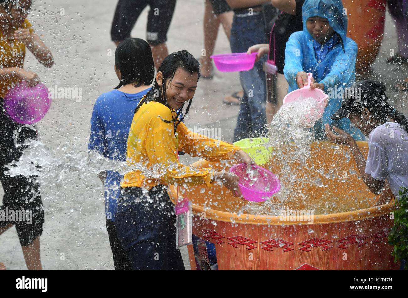 Baoting, China's Hainan Province. 28th Aug, 2017. People celebrate the ...