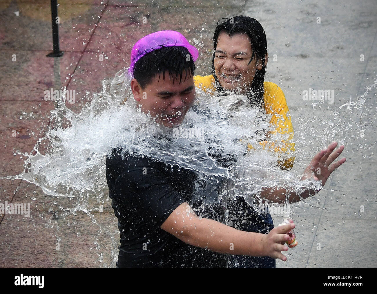 Baoting, China's Hainan Province. 28th Aug, 2017. People celebrate the ...