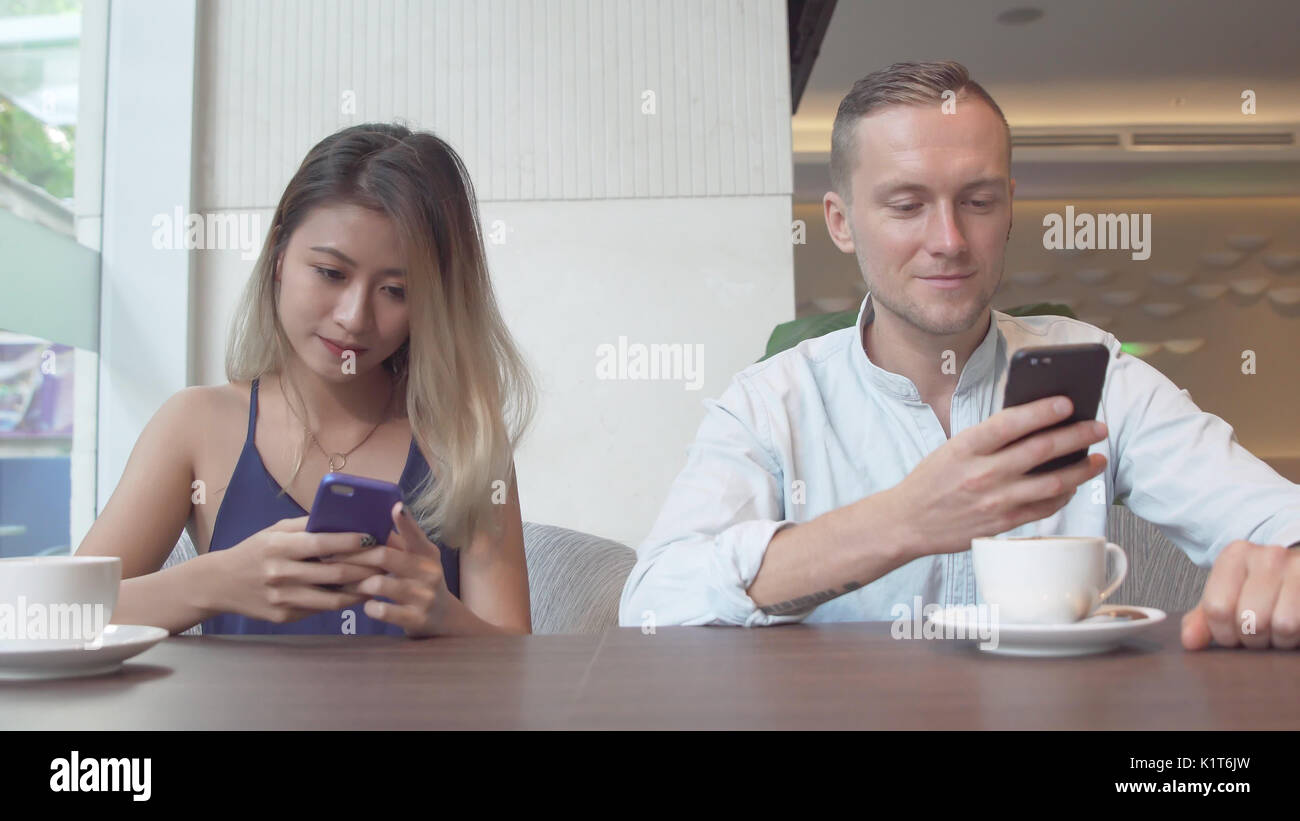 Texting phone ignore hi-res stock photography and images - Alamy