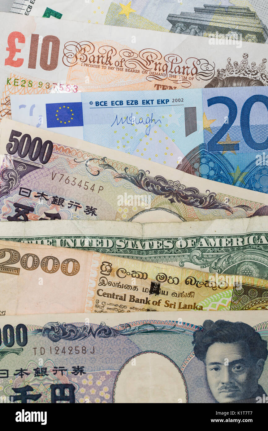 Global currency background Stock Photo - Alamy
