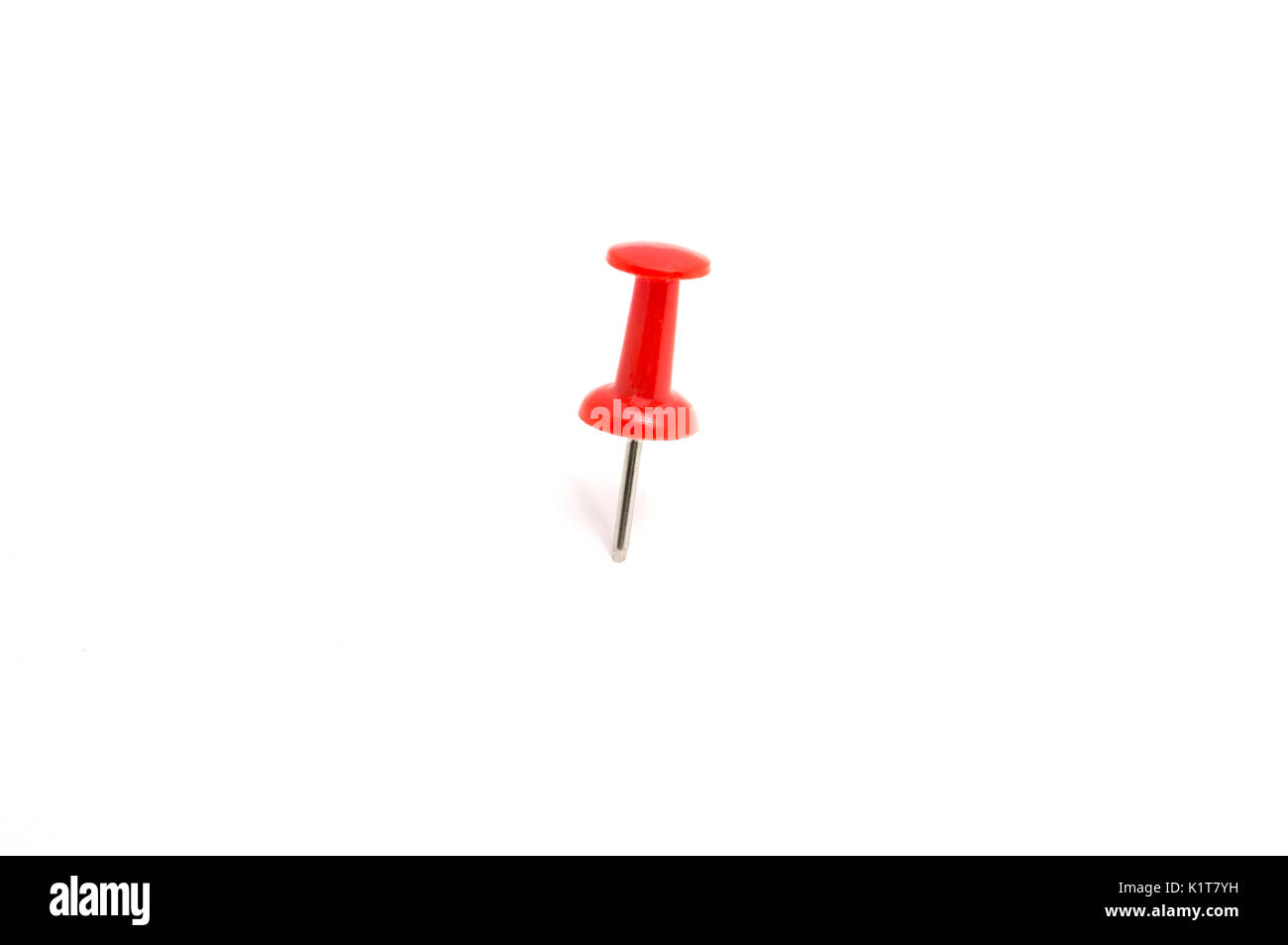 Red color push pin and on isolated white background Stock Photo - Alamy