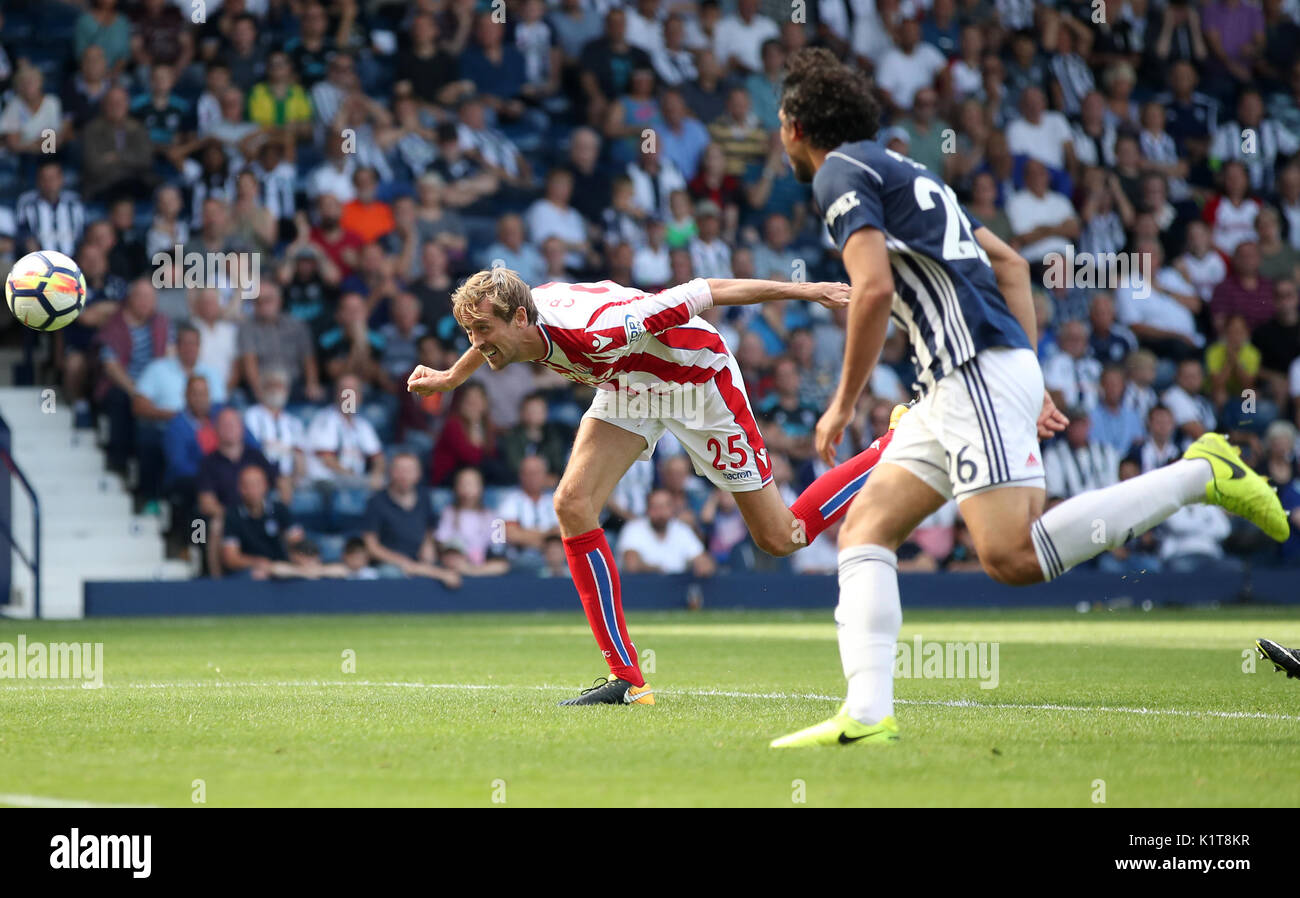 Stoke City's Peter Crouch scores his side's first goal of the game ...