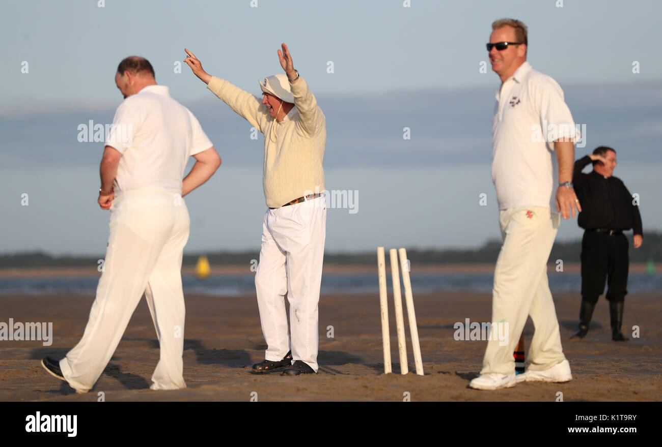 A six is signaled during the annual Brambles cricket match between The ...