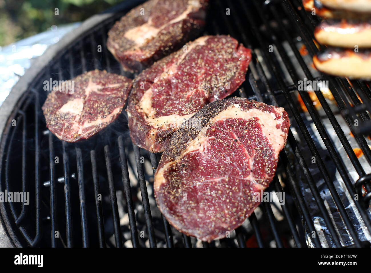 Fresh and raw ribeye meat before grilled. Uncooked steaks grilled BBQ ...