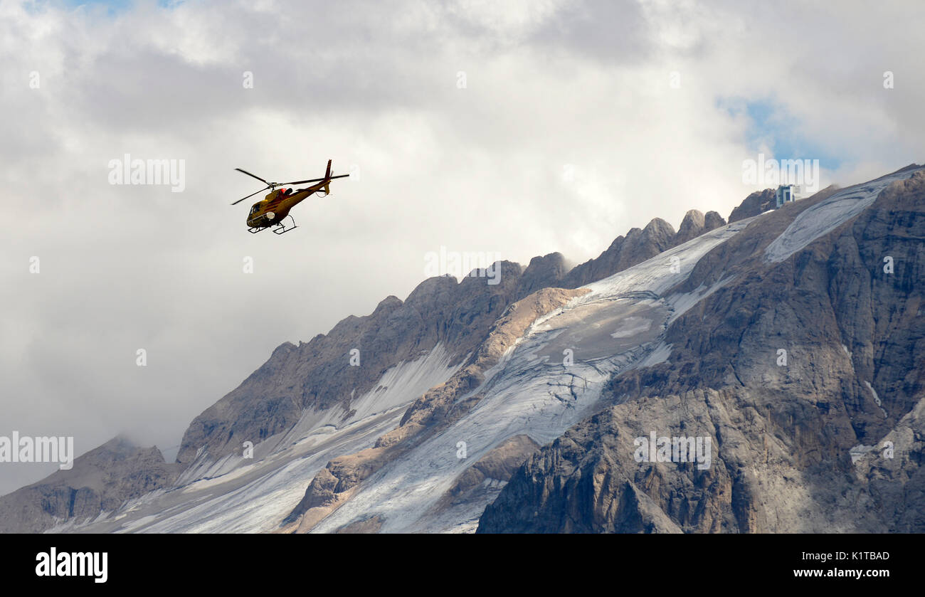 Mountain rescue helicopter, Canazei, Marmolada, Dolomiti, Italy Stock ...