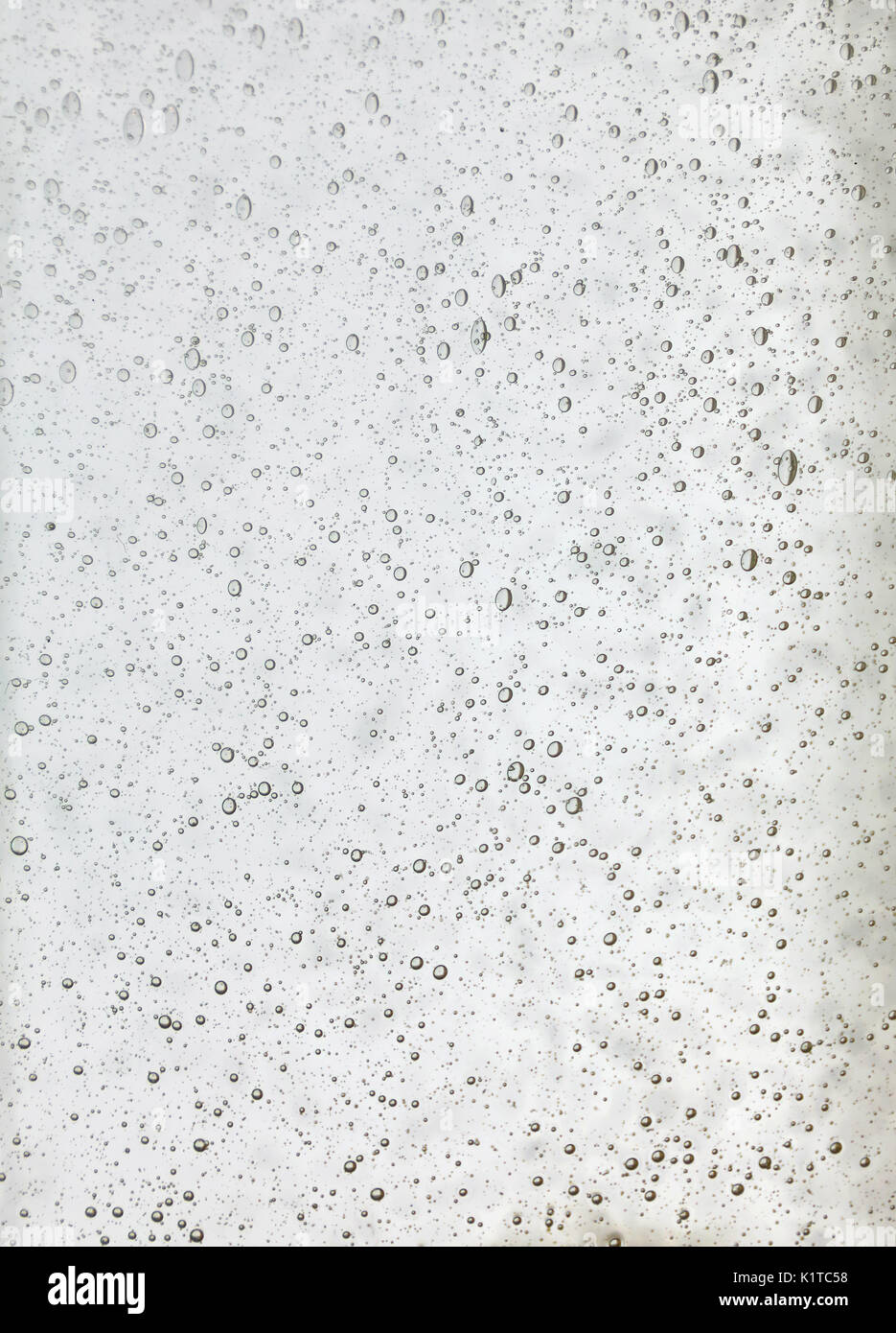 Background texture of solid transparent white glass with pattern of air ...